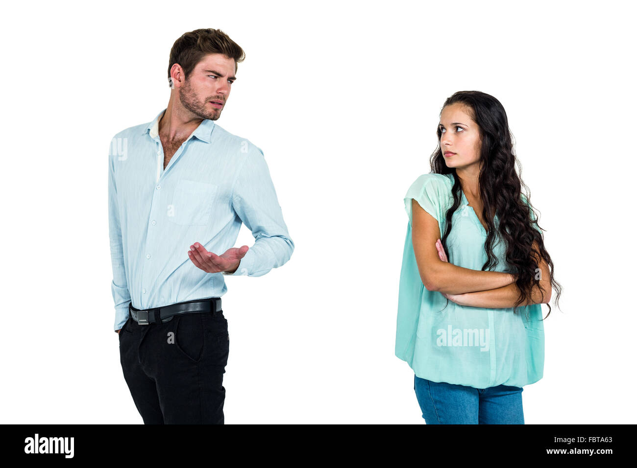 Couple standing back to back while arguing Stock Photo - Alamy