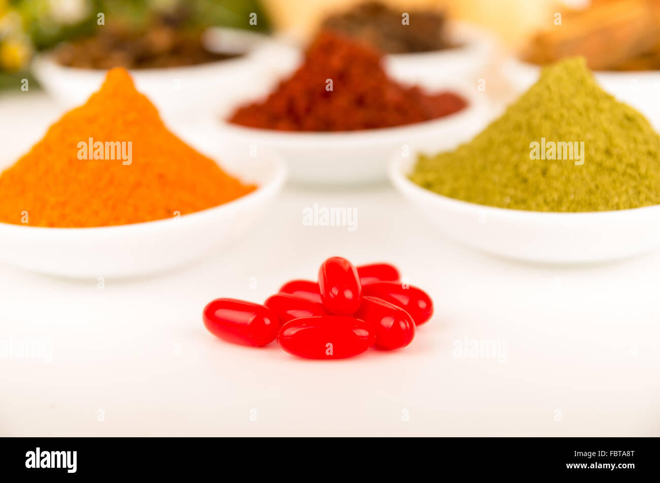 Beautiful delicate colorful display of different spices red green ...