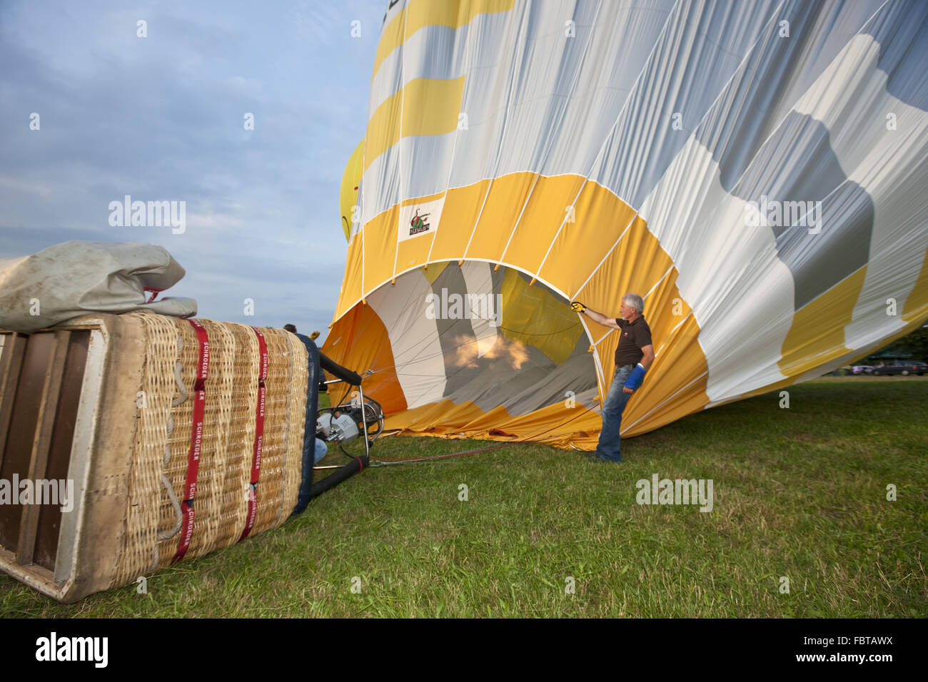 Hot air ballon preparing for launch Stock Photo - Alamy