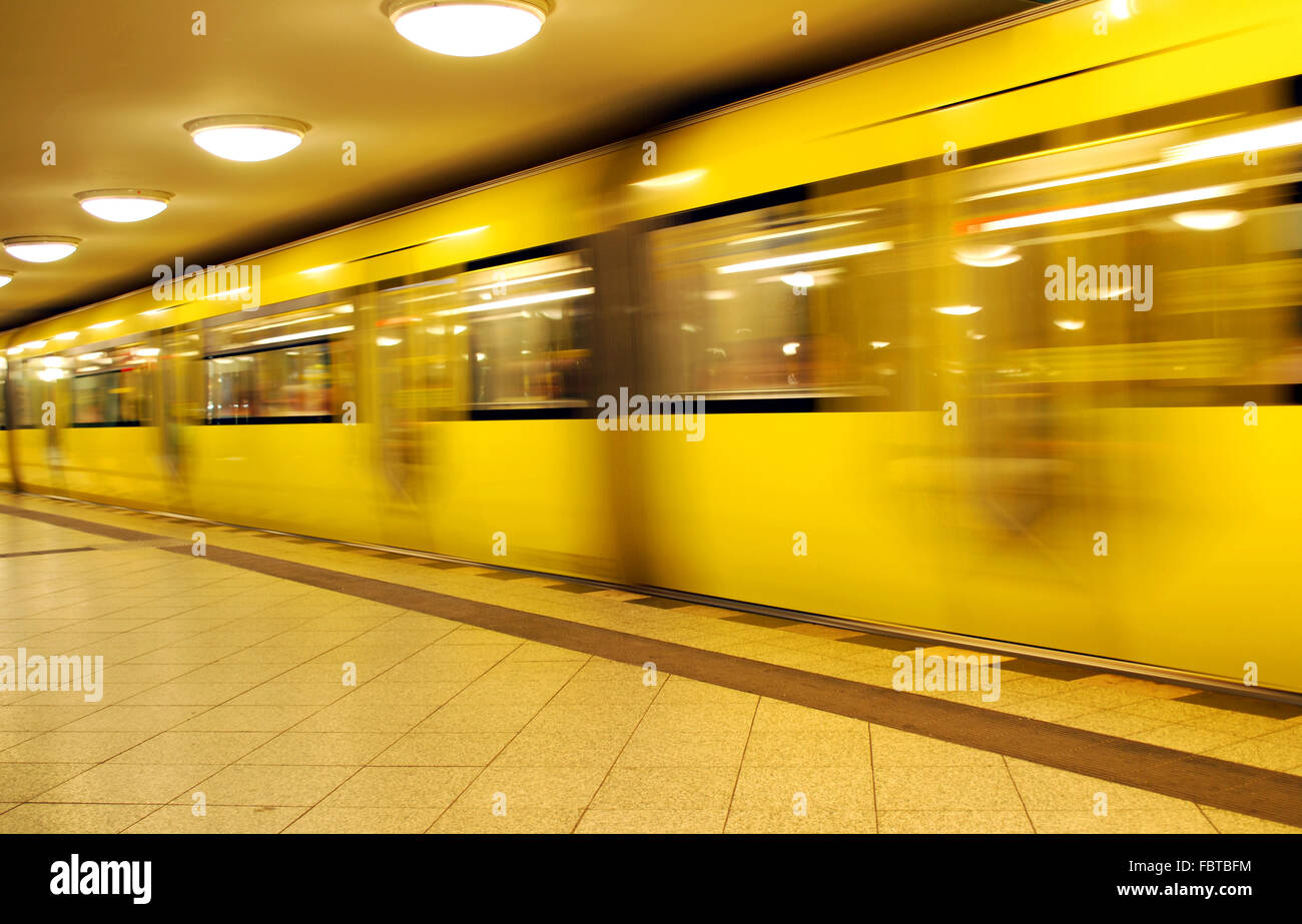 yellow passing berlin metro train Stock Photo - Alamy