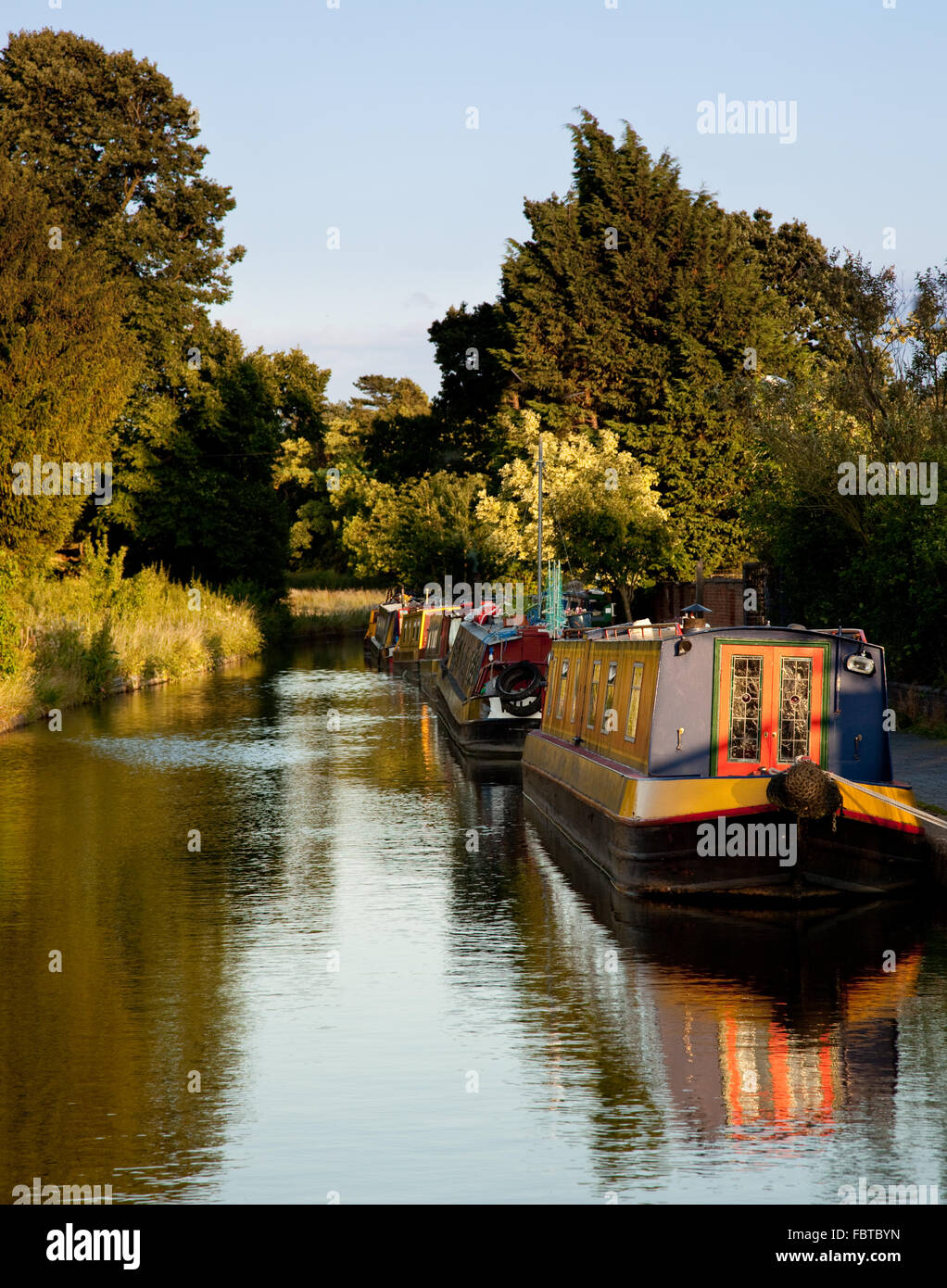 Row of canal barges on the river near Ellesmere in Shropshire Stock ...