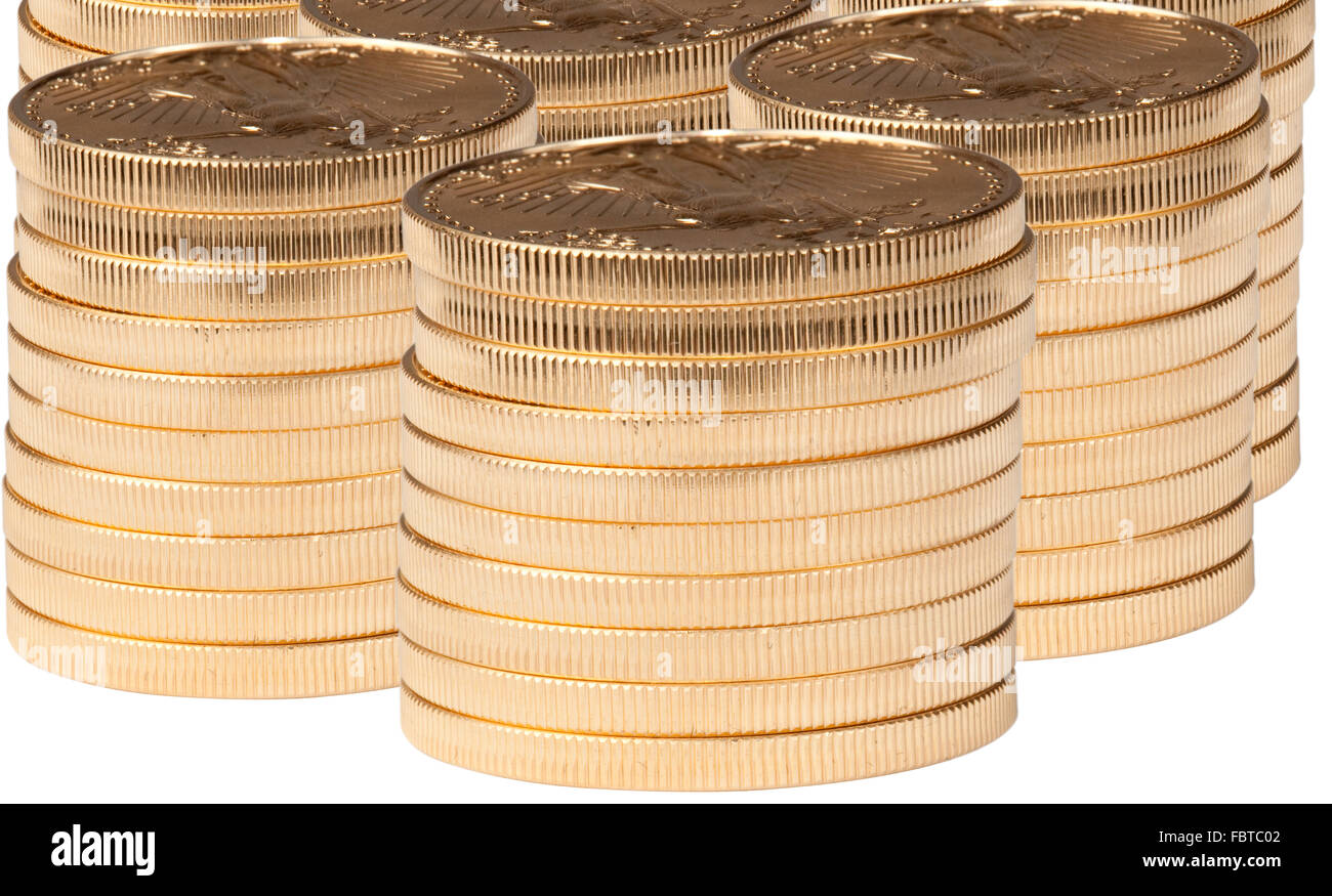 Vertical stacks of gold coins isolated from background Stock Photo - Alamy