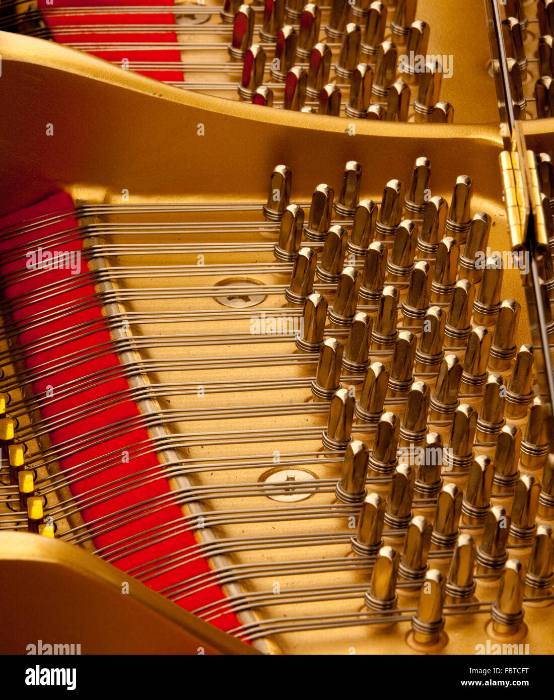 Detail inside the body of a black lacquered grand piano Stock Photo - Alamy