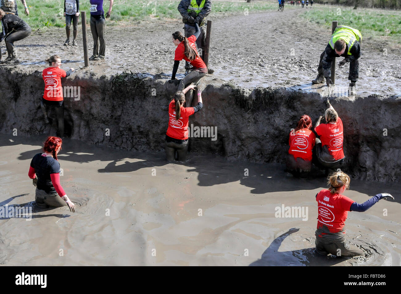 Girls running mud hi-res stock photography and images - Alamy