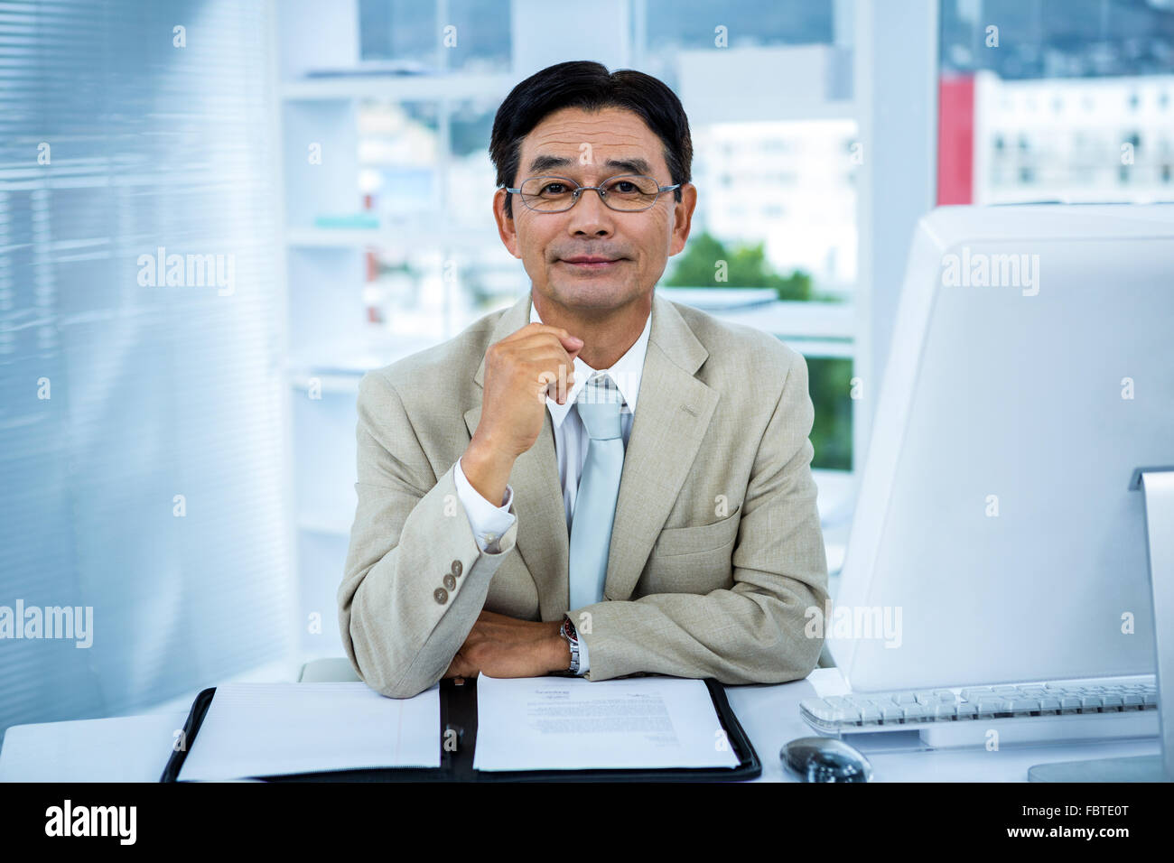 Portrait of a smiling businessman Stock Photo - Alamy