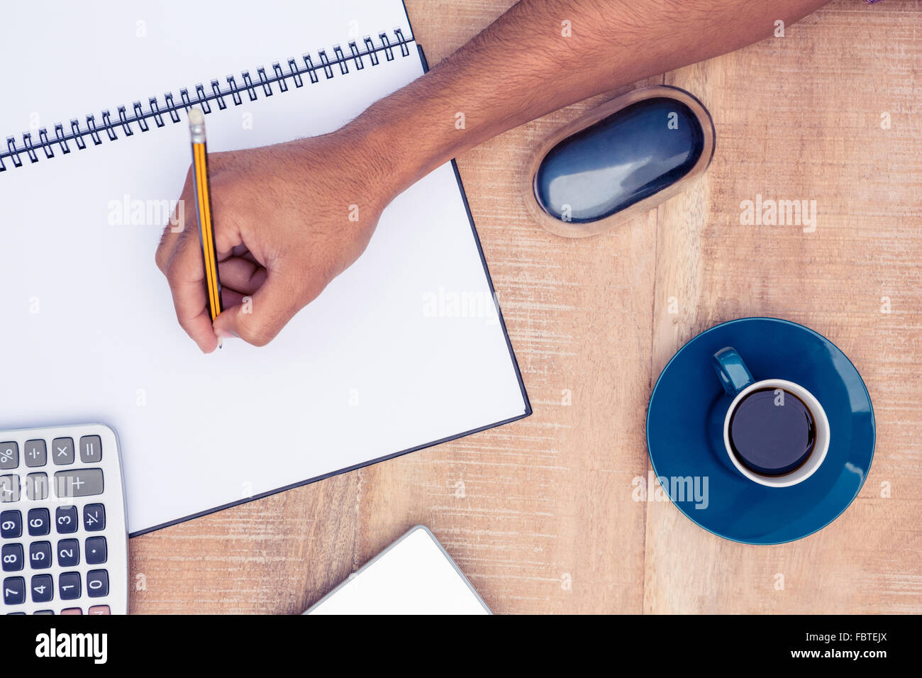 Overhead view man writing hi-res stock photography and images - Alamy