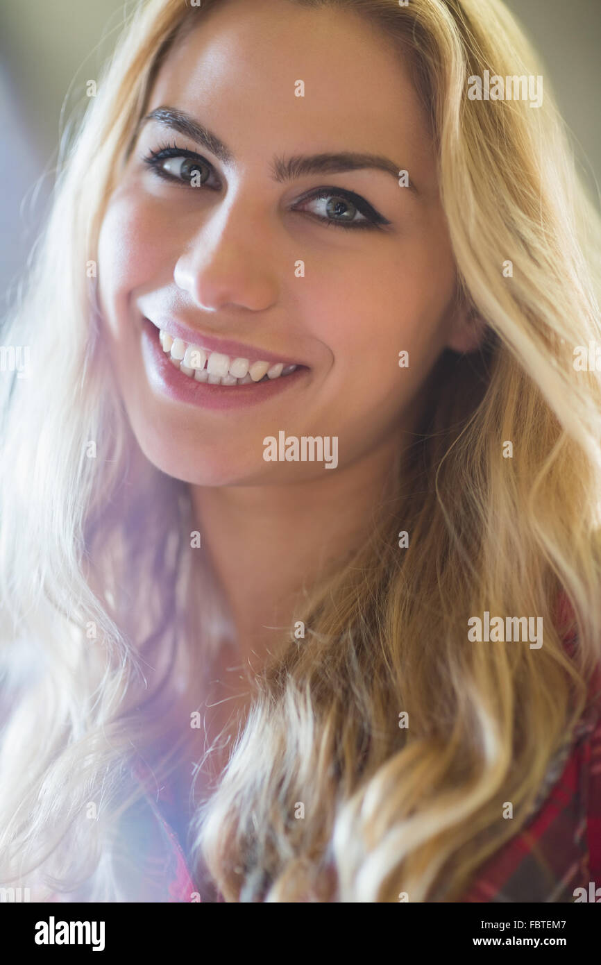 Smiling female student during class Stock Photo - Alamy