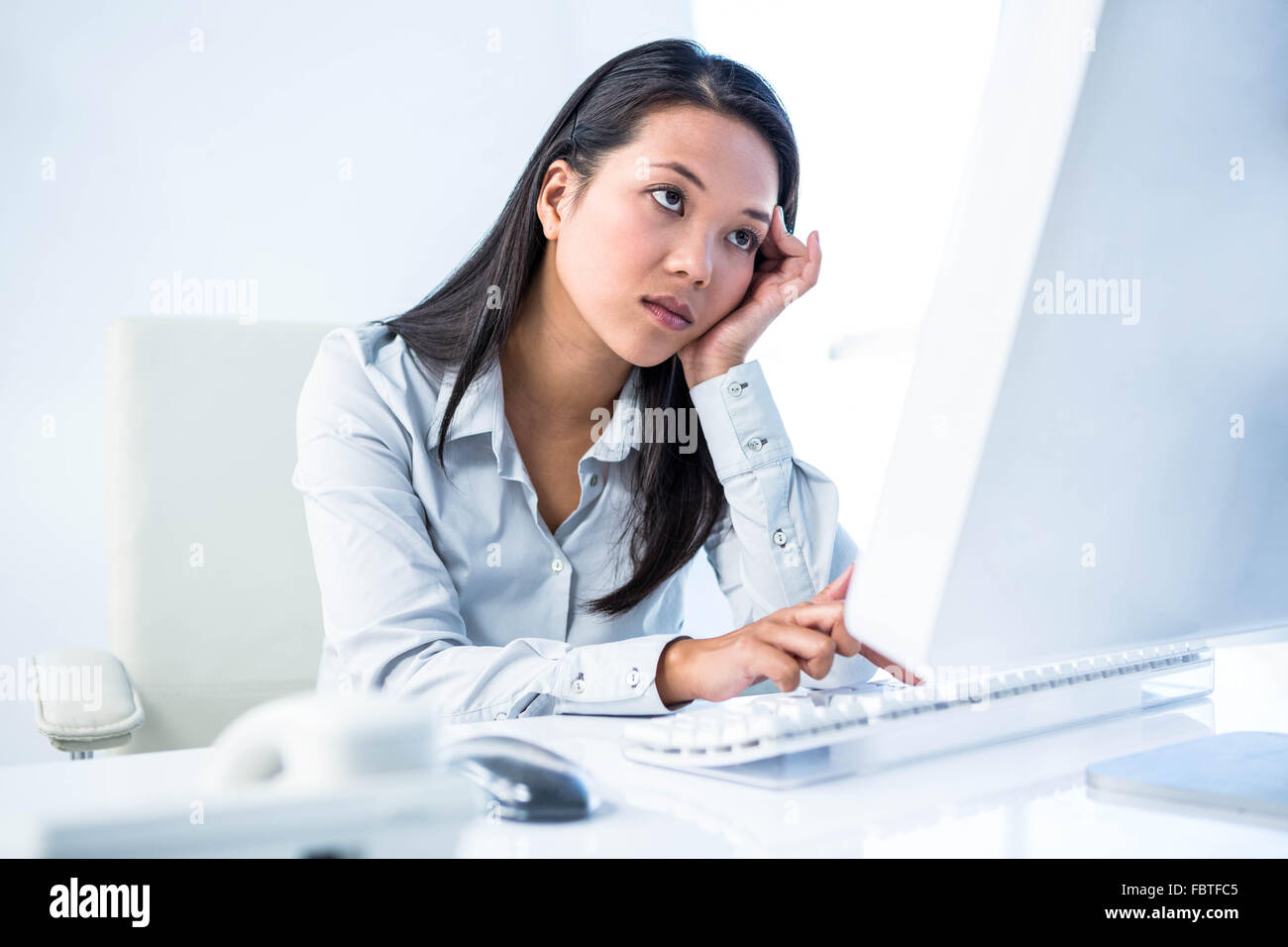 Exhausted worried young asian hi-res stock photography and images - Alamy