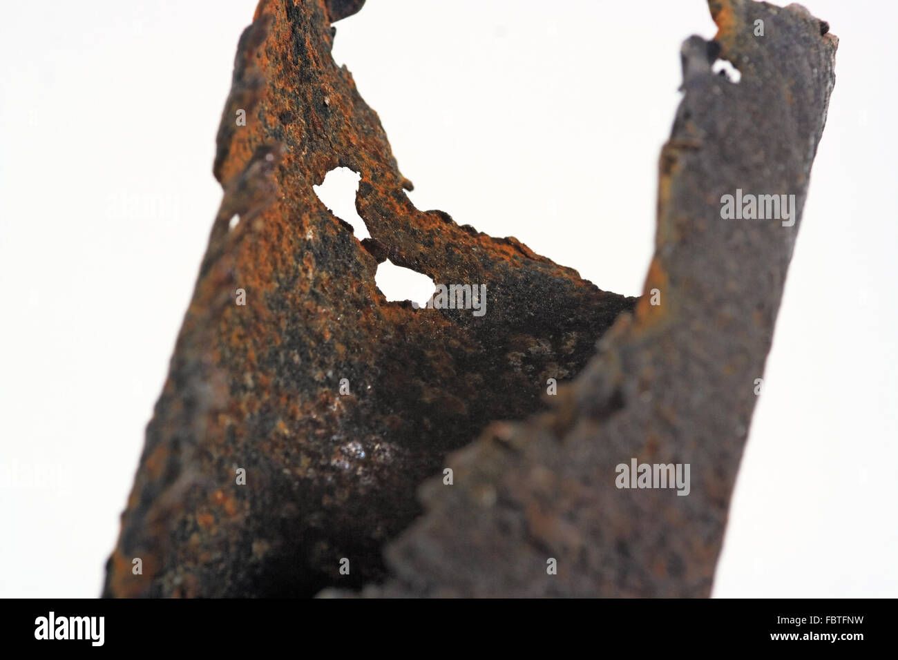 Rusted pipe to rust through pipe Stock Photo - Alamy