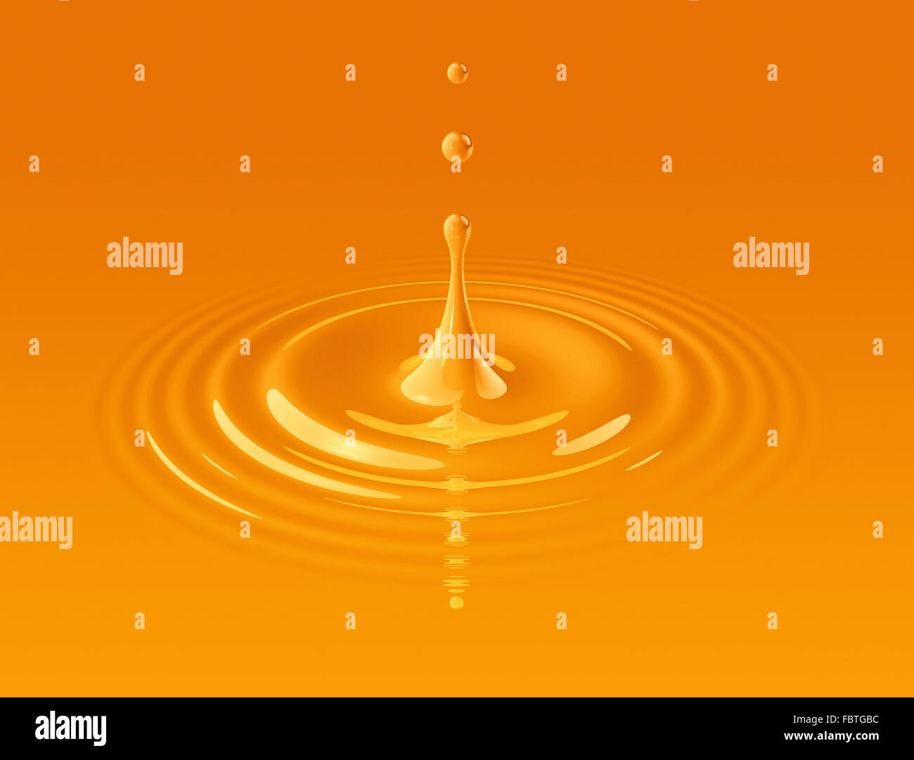 drop of orange juice and ripple Stock Photo - Alamy