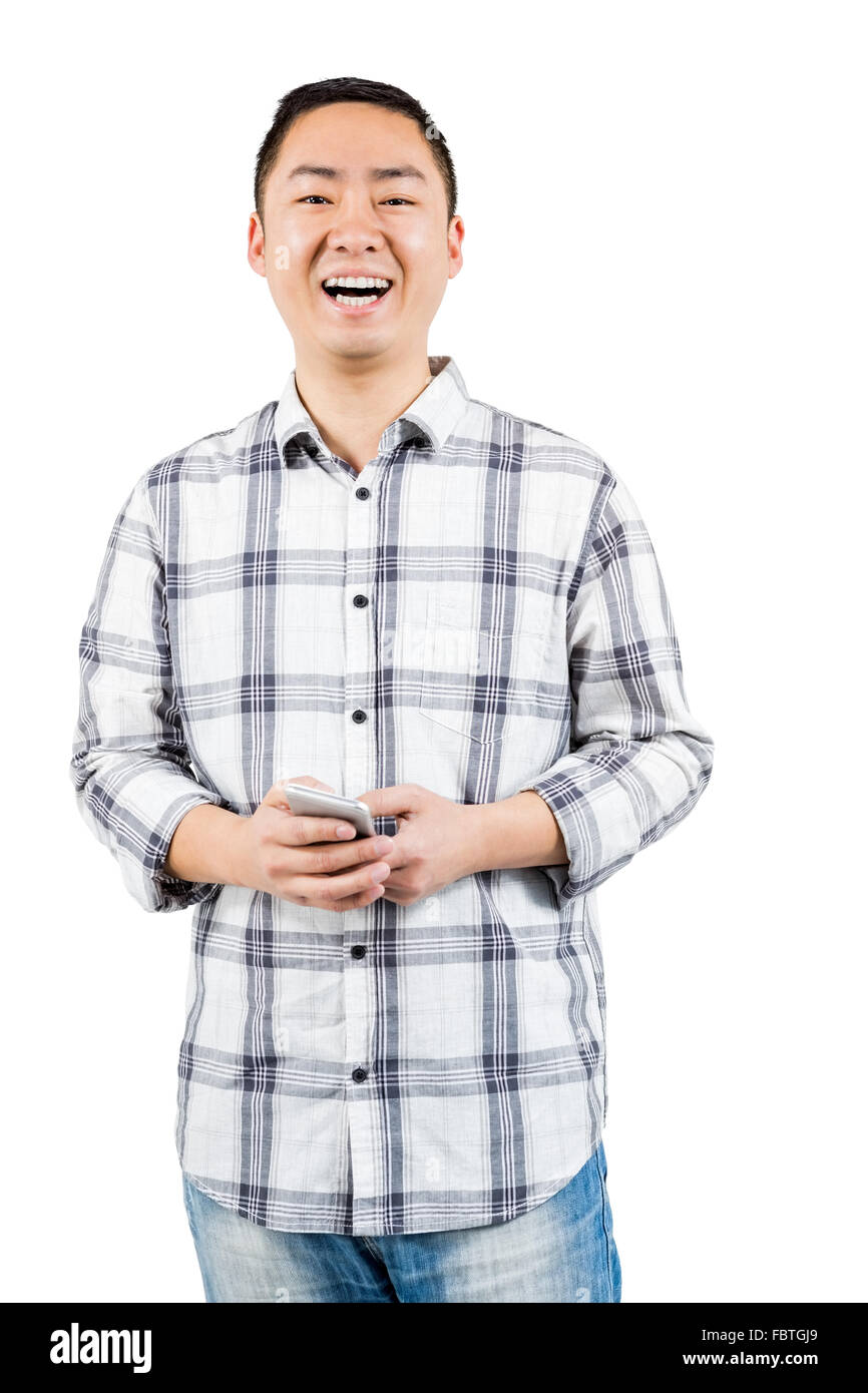 Happy man holding smart phone Stock Photo - Alamy