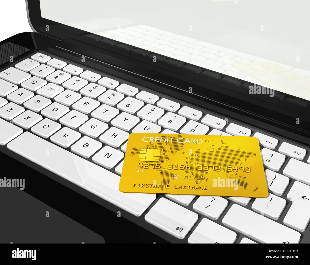 gold credit card on laptop Stock Photo - Alamy