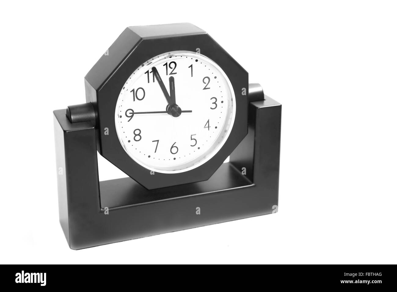 Hand on alarm clock Black and White Stock Photos & Images - Alamy