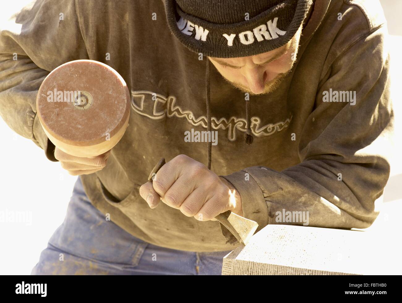 Stonecutter at the work Stock Photo - Alamy