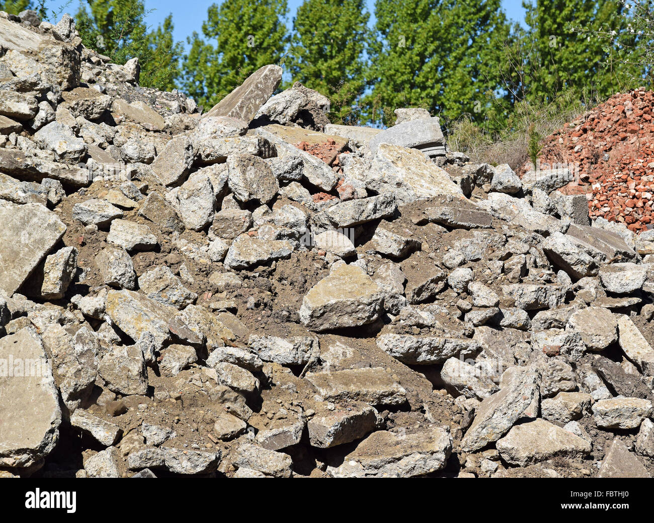 Broken concrete and brick construction materials at the construction ...