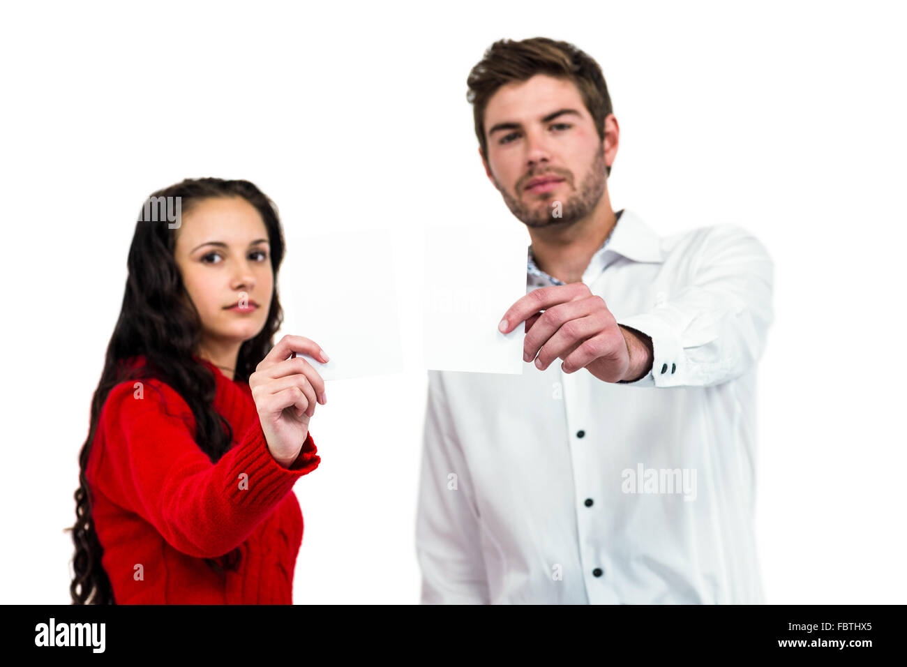Couple holding document Stock Photo - Alamy