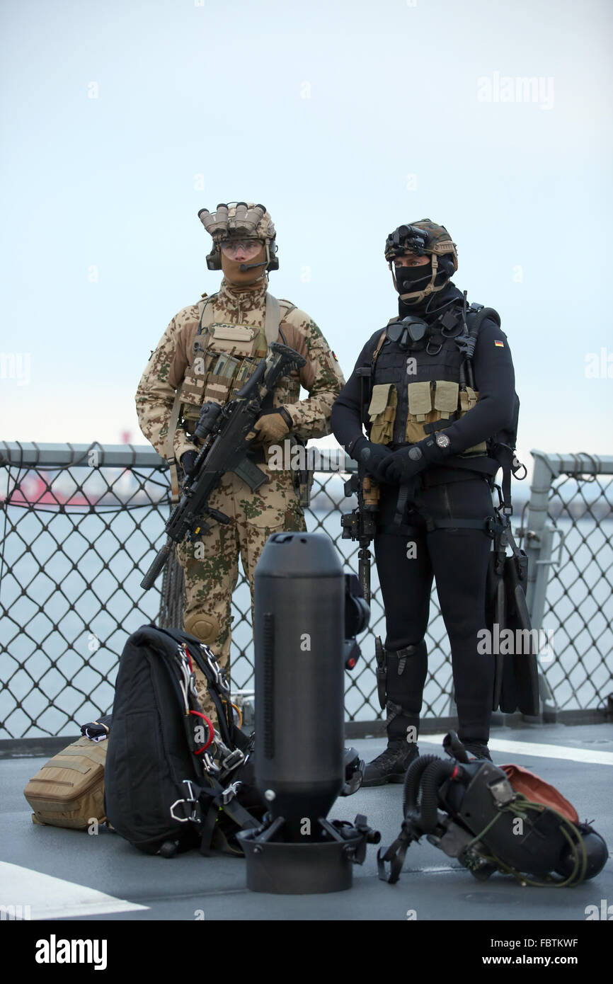 Kiel, Germany. 19th Jan, 2016. Two German Navy frogmen wearing land ...