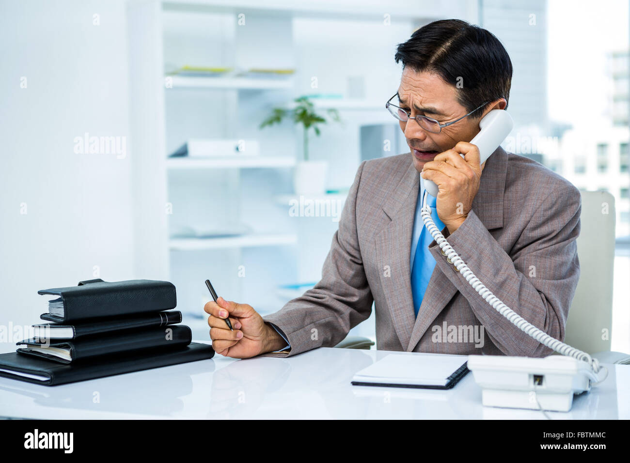 Worried phone call senior hi-res stock photography and images - Alamy