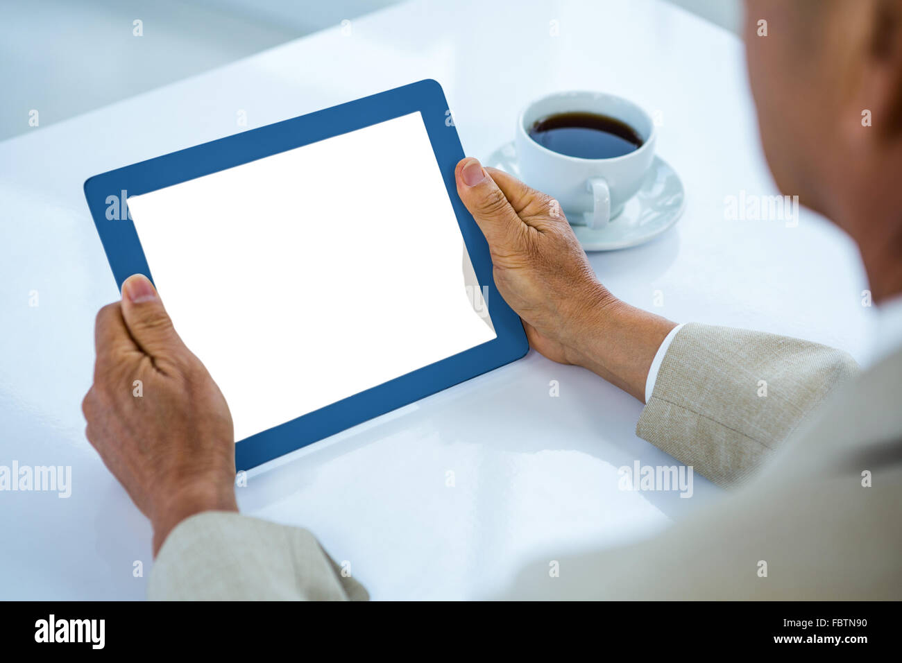 businessman using tablet Stock Photo - Alamy
