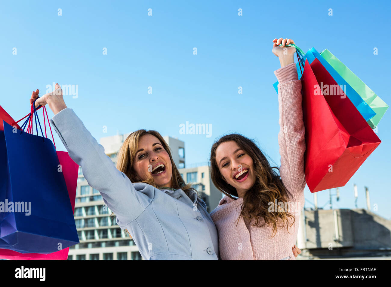 Mother and daughter excited Stock Photo - Alamy
