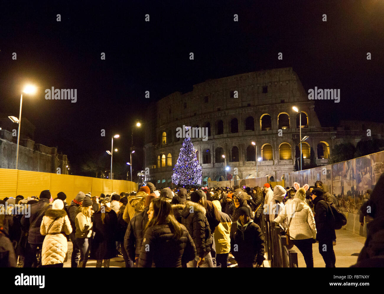 ROME, ITALY - JANUARY 1 2015: crowd of people in Colosseo street in ...