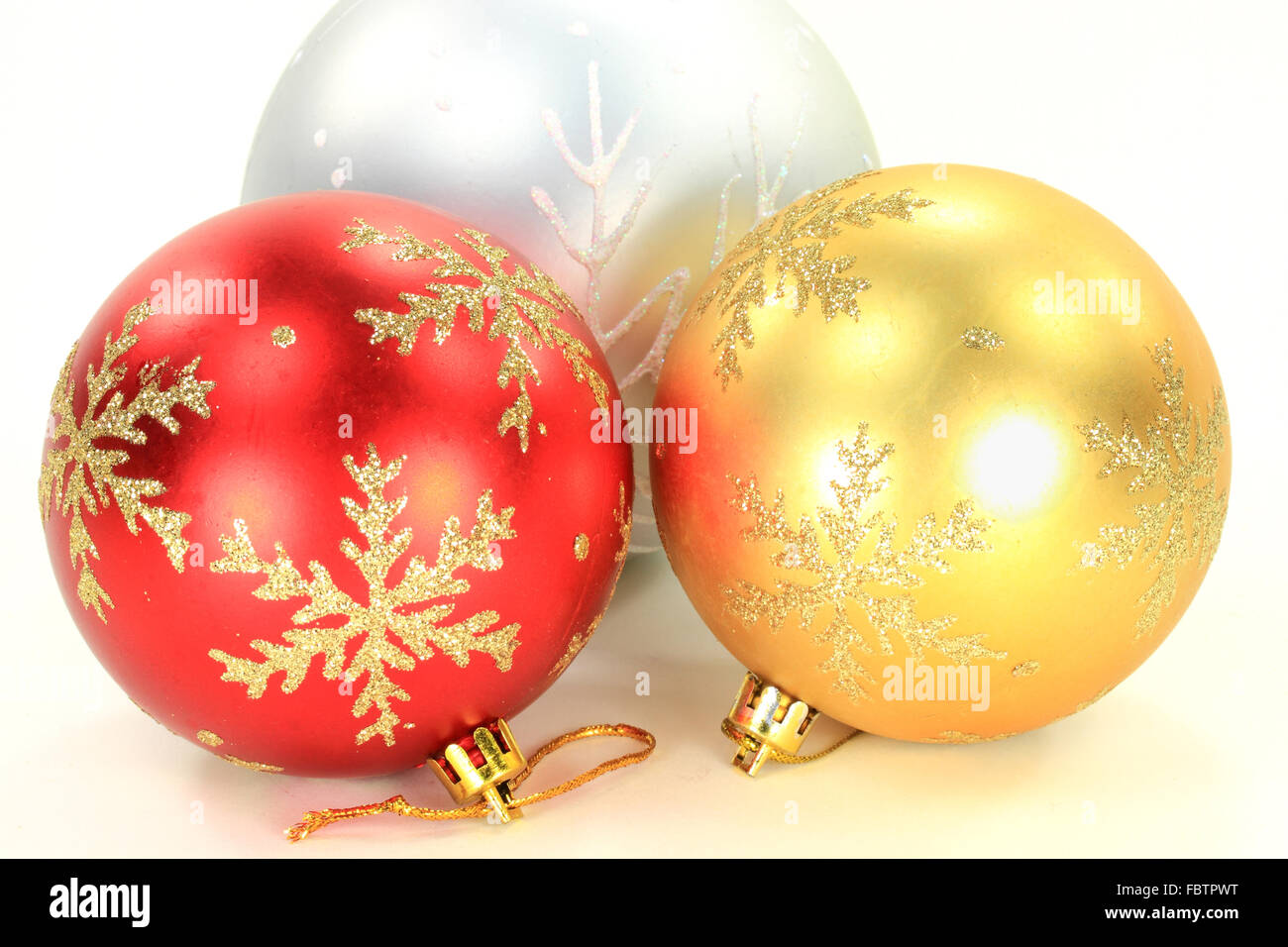 Three Christmas Decoration Balls Stock Photo - Alamy