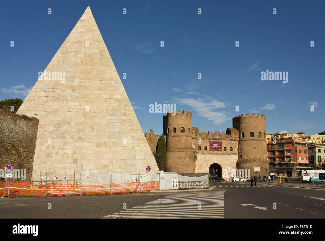 ROME, ITALY - JANUARY 1 2015: Porta San Paolo Gate and ancient Pyramid ...