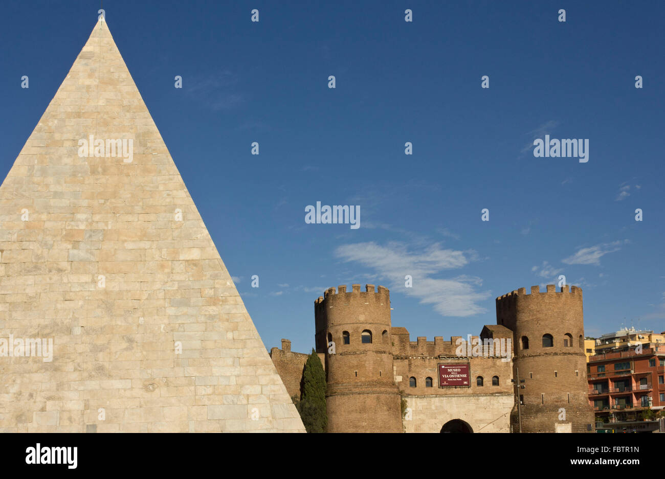 ROME, ITALY - JANUARY 1 2015: Porta San Paolo Gate and ancient Pyramid ...