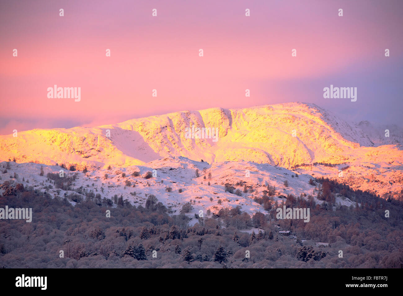 Sunrise over Wetherlam from the outskirts of Ambleside in the Lake ...