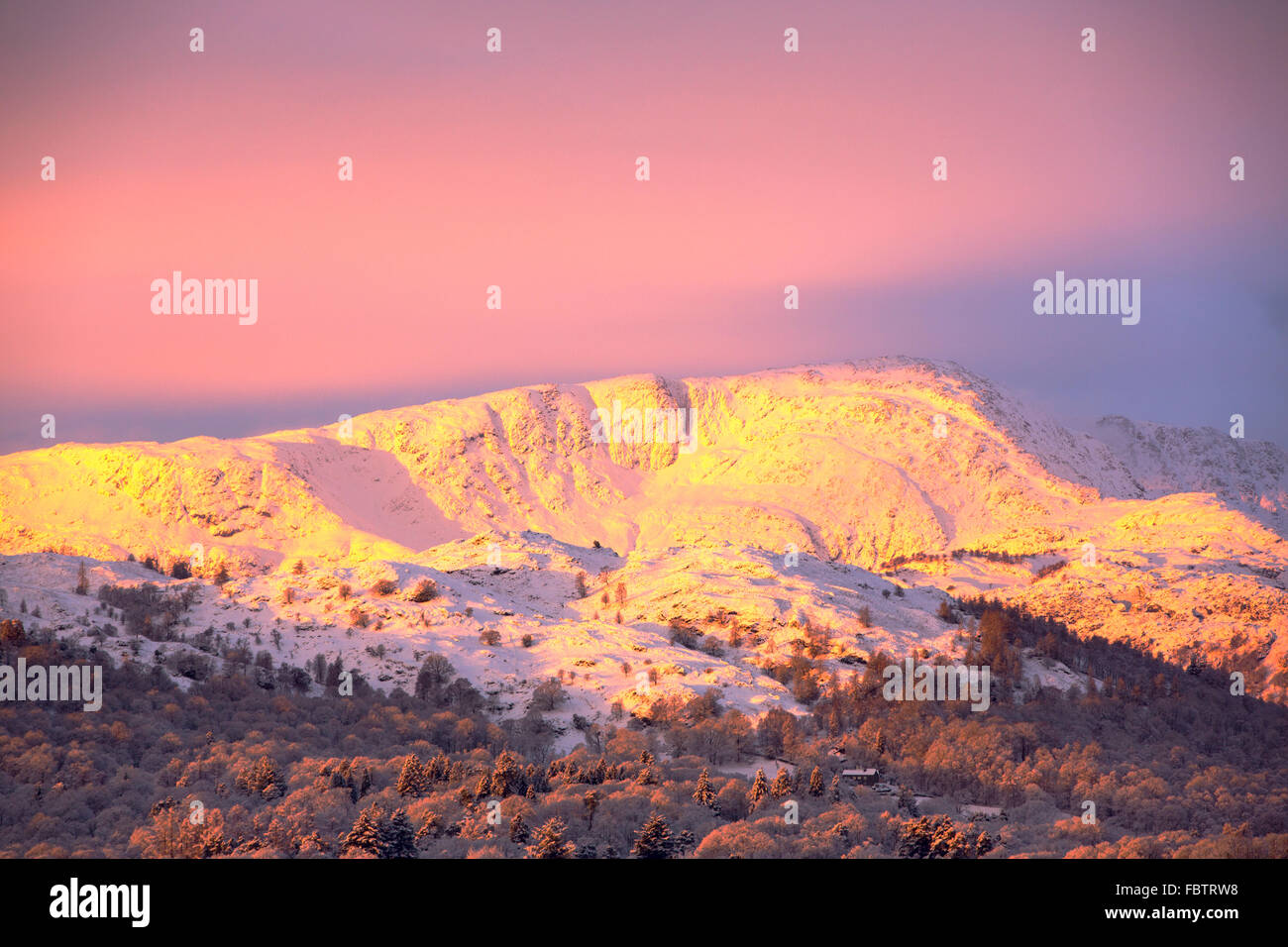 Sunrise over Wetherlam from the outskirts of Ambleside in the Lake ...