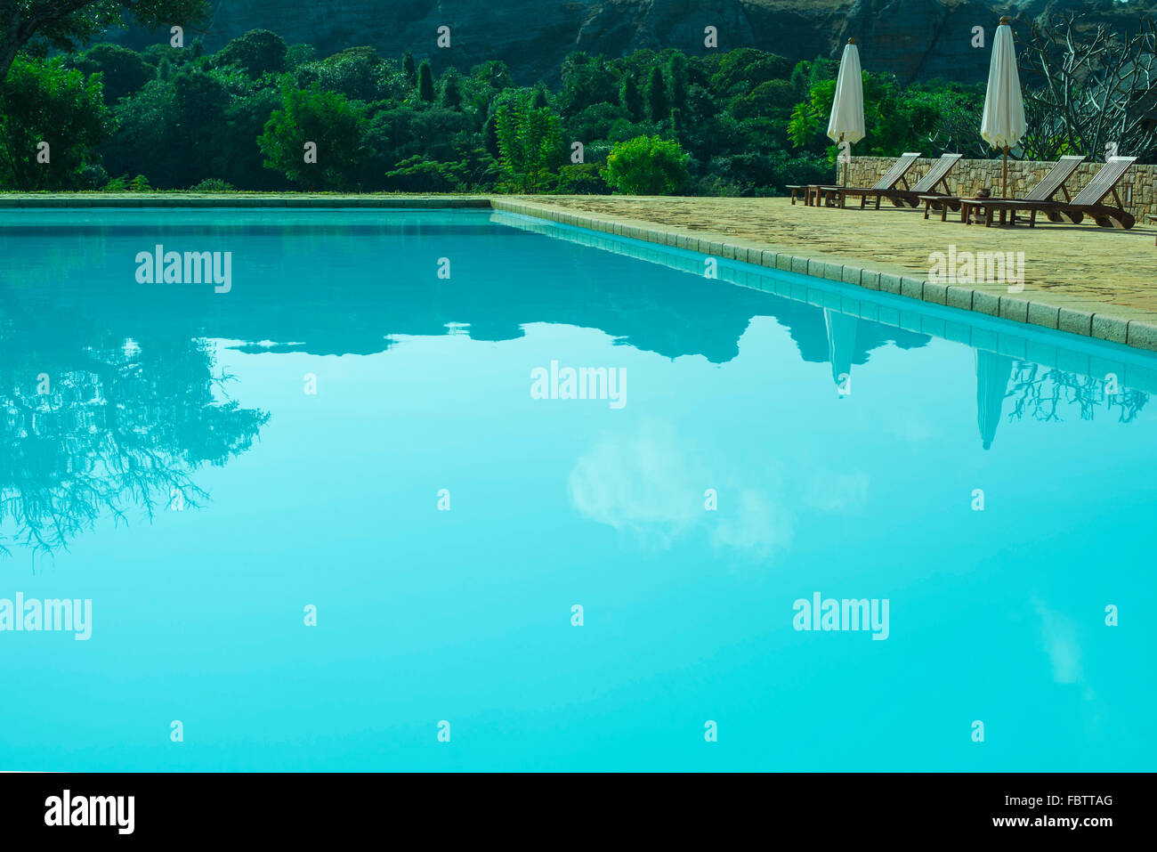 Tranquil swimming pool Stock Photo - Alamy