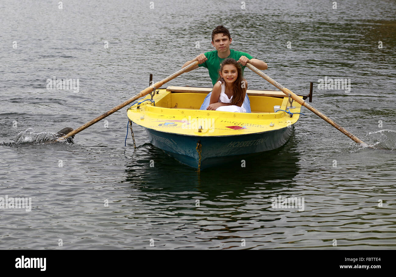 Children in a rowboat Stock Photo - Alamy