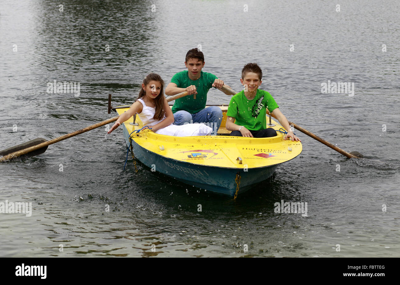 Children in a rowboat Stock Photo - Alamy