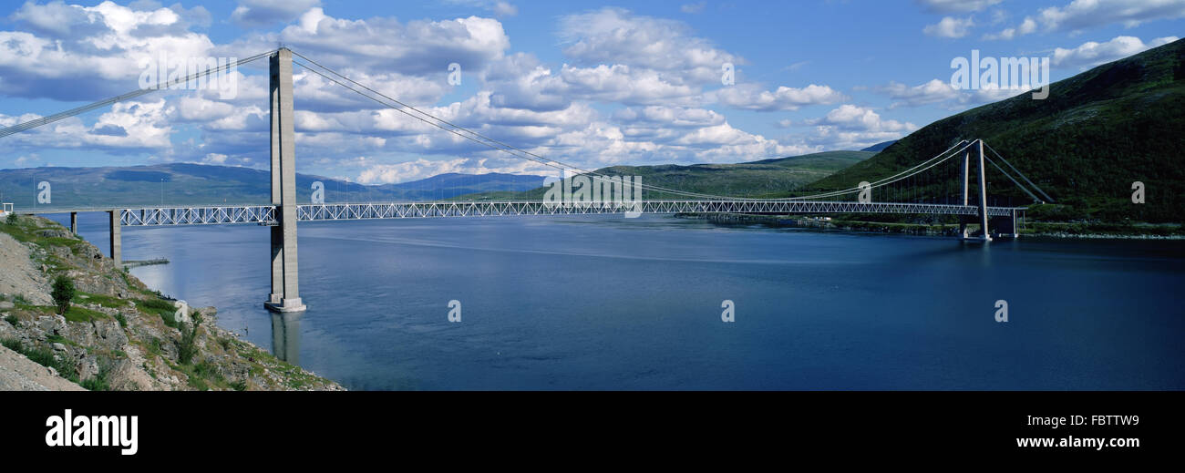 Bridge over wide river Stock Photo - Alamy