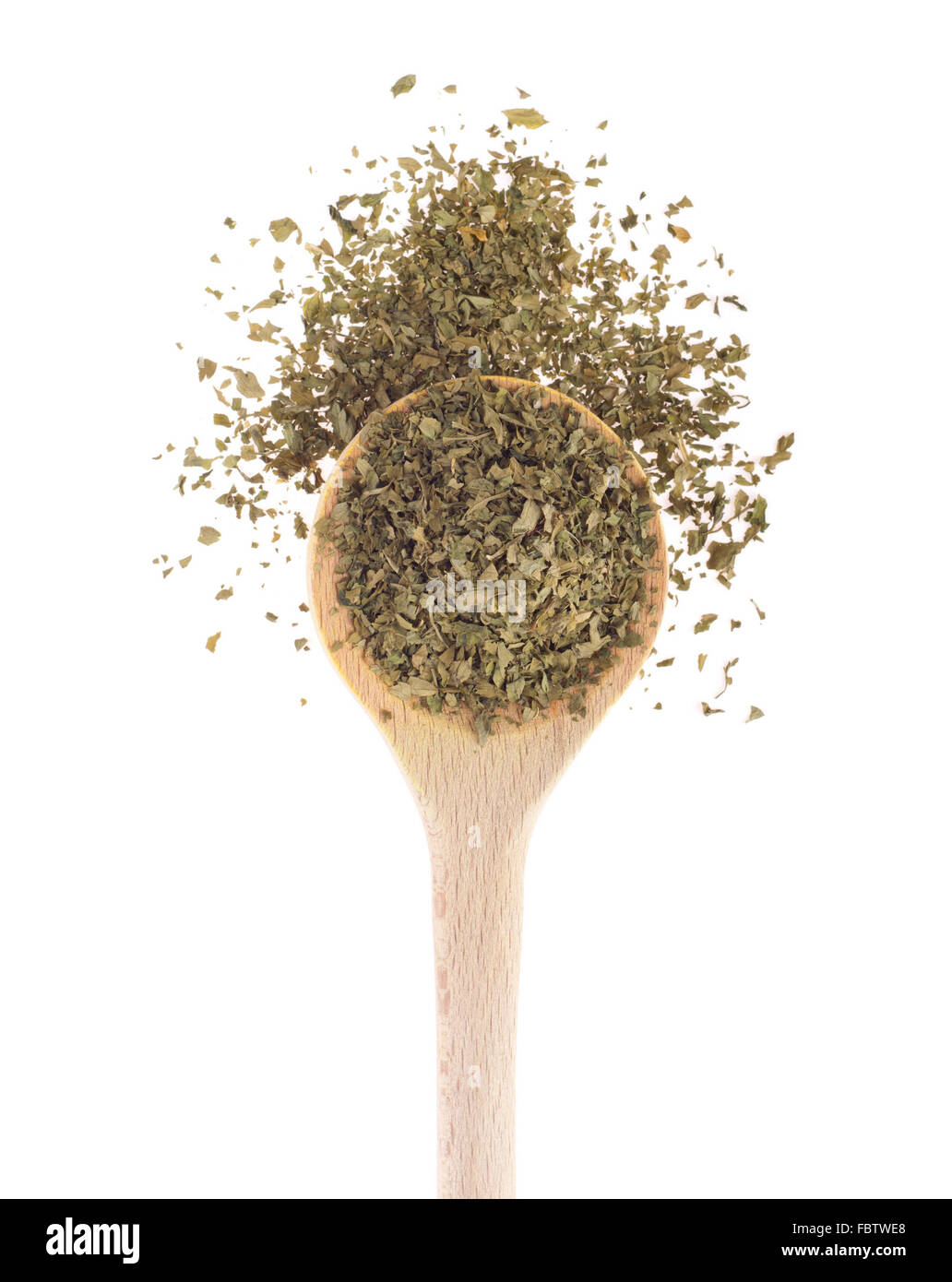 parsley spice on a wooden spoon Stock Photo - Alamy