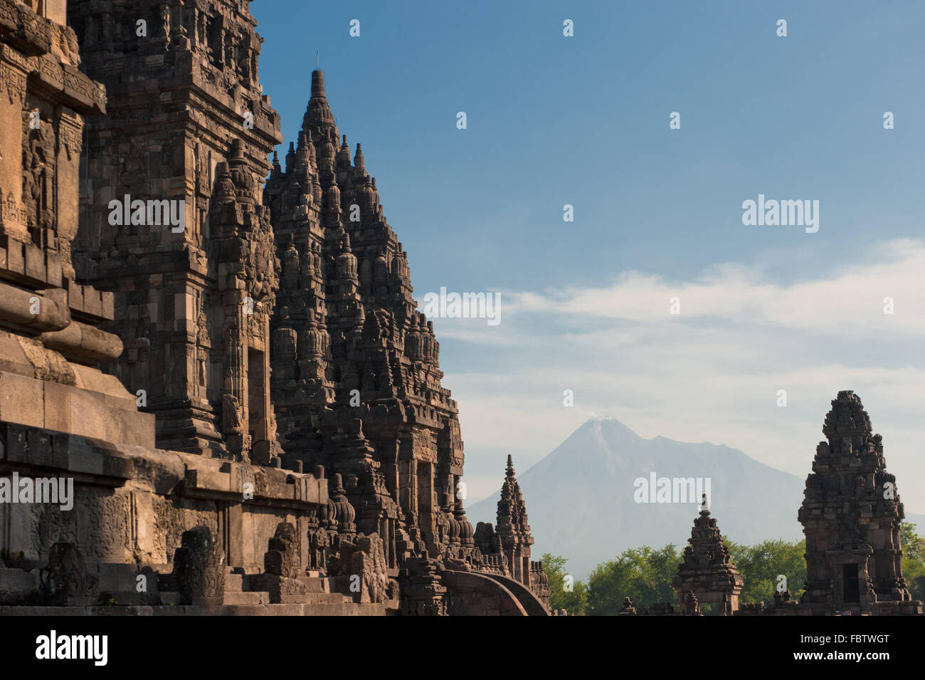 Prambanan temple with Merapi volcano, Java, Indonesia Stock Photo - Alamy