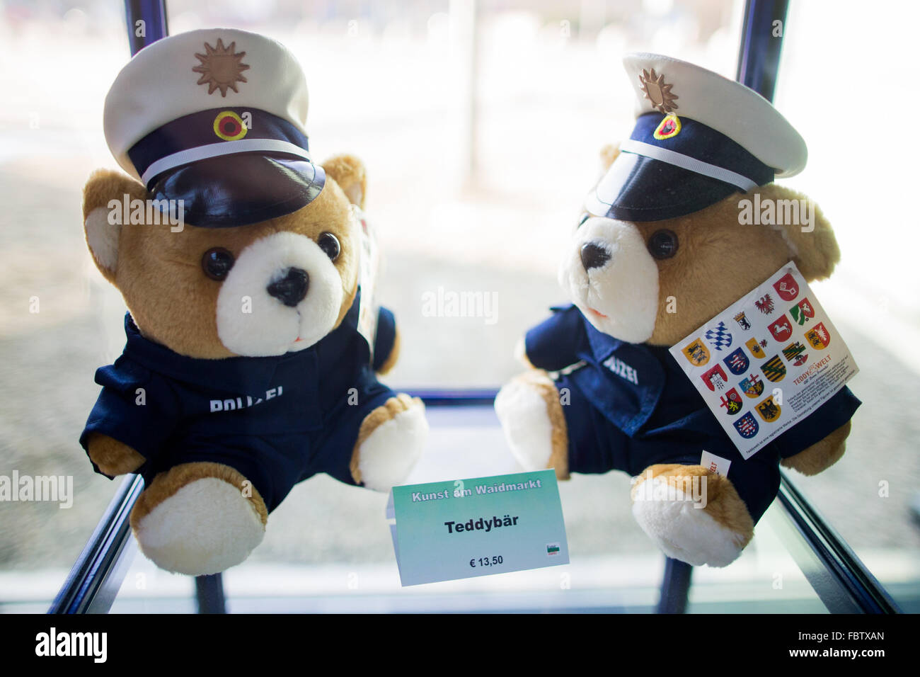 Two teddy bears in police uniform for sale at the police headquarters ...