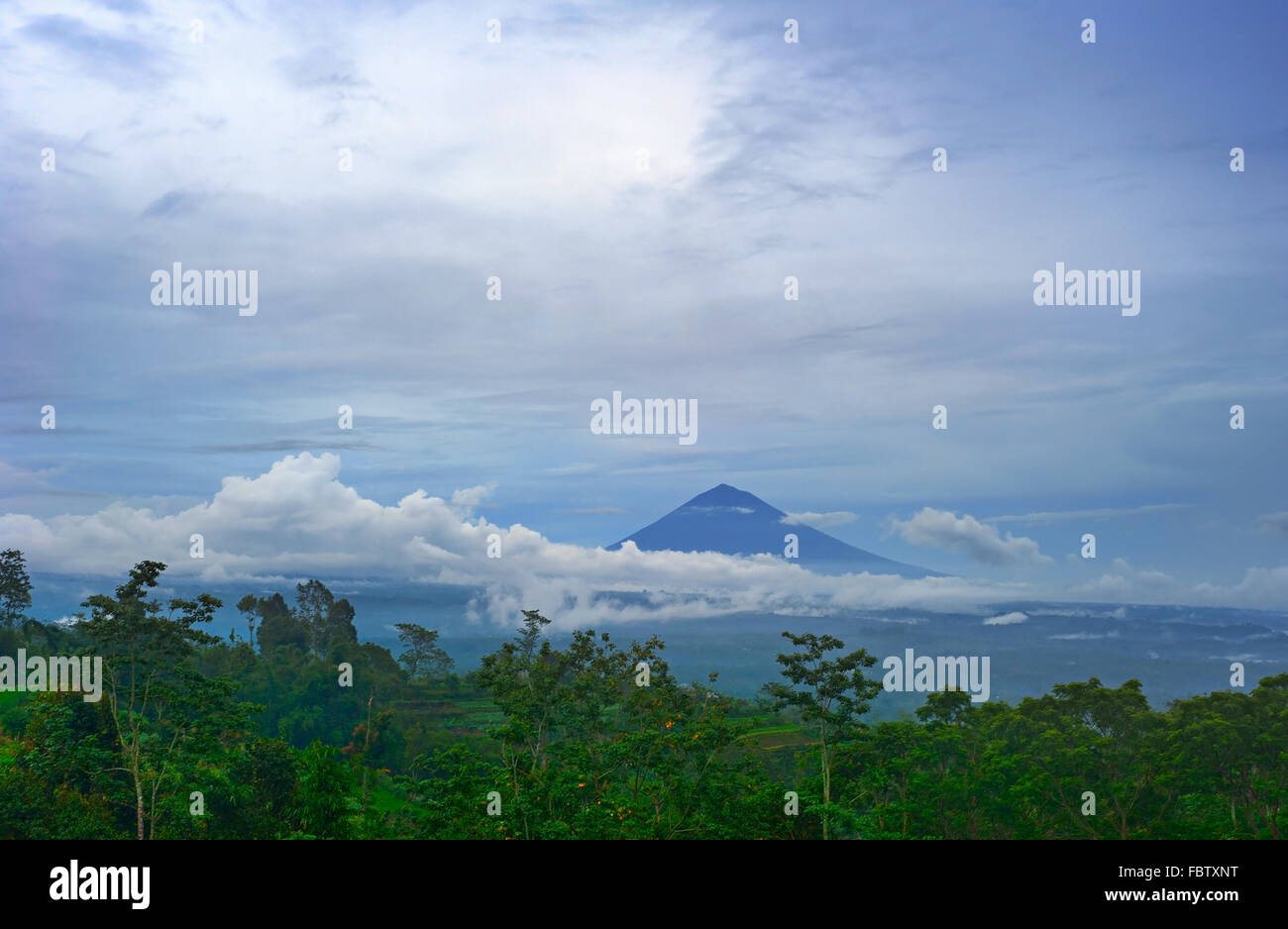 Balinese landscape with volcano at dusk. Bali island, Indonesia Stock ...