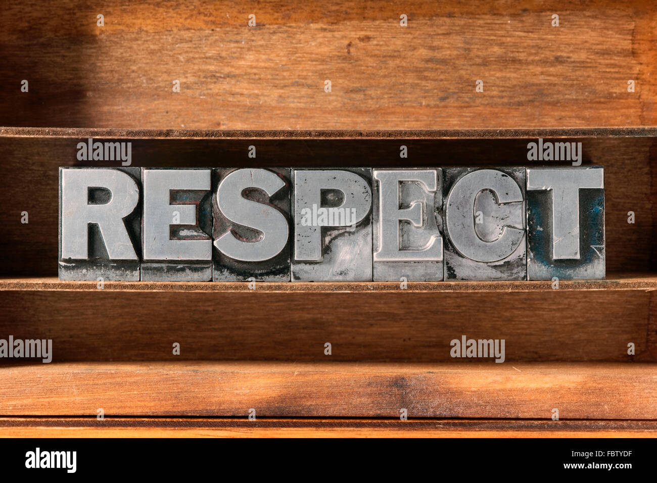 respect word made from metallic letterpress type on wooden tray Stock ...
