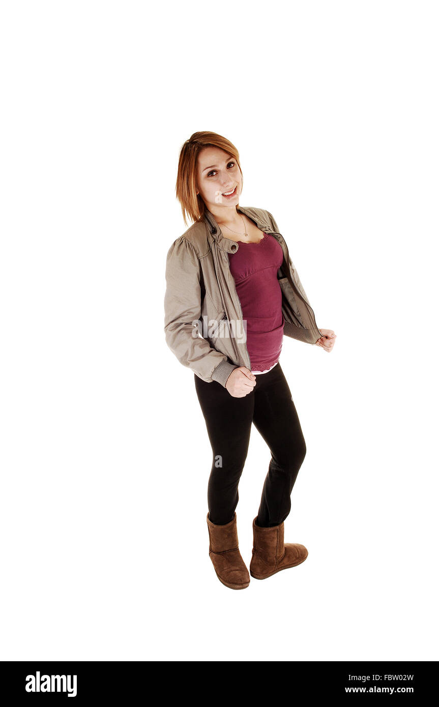 Girl taking off jacket Stock Photo - Alamy
