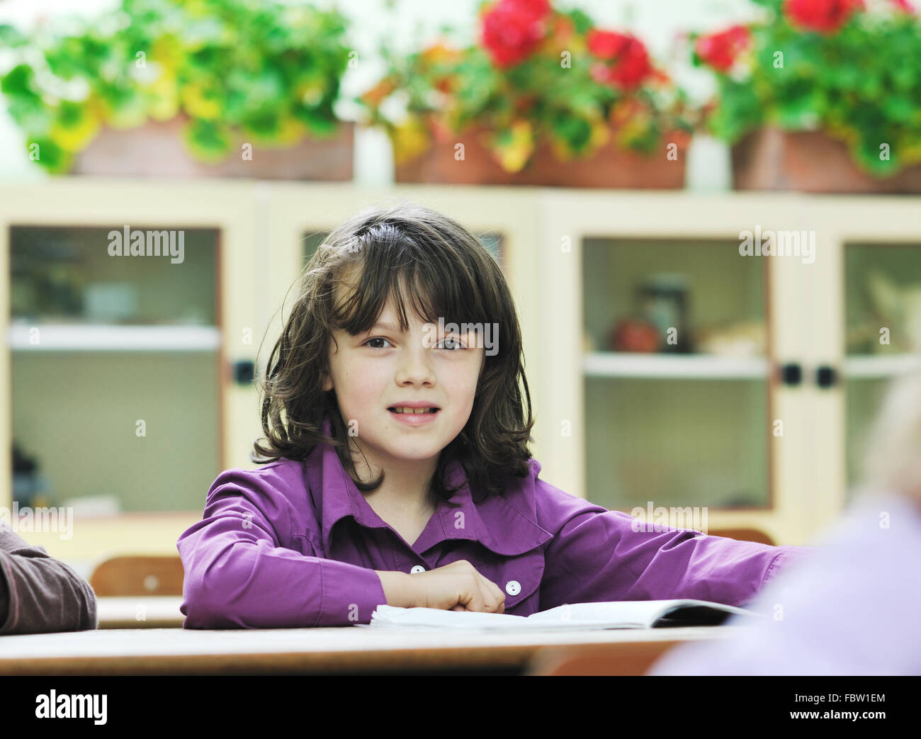 happy child in schoold have fun and learning leassos Stock Photo - Alamy