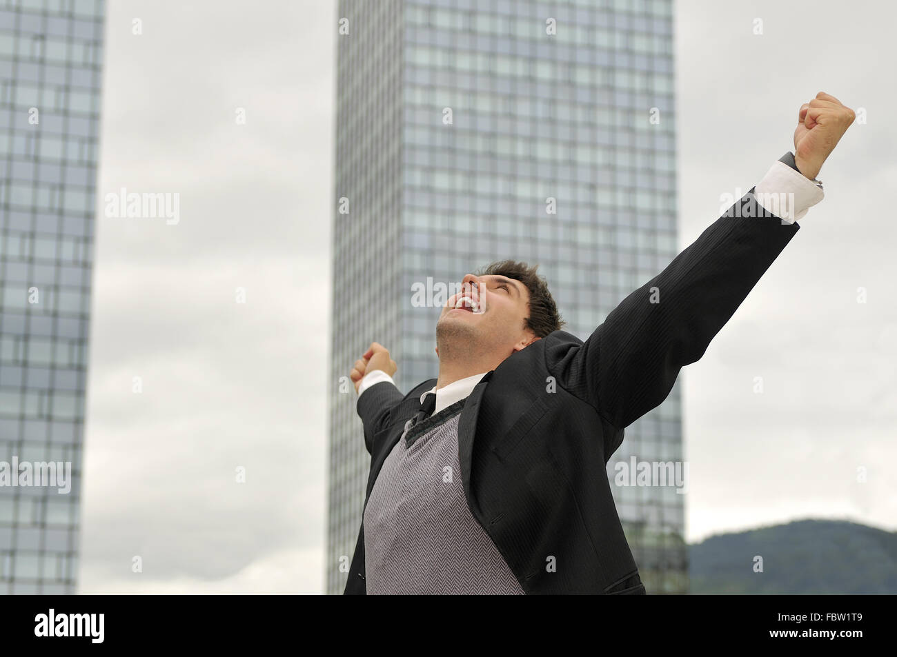 Photo of happy winner businessman screaming from joy Stock Photo - Alamy