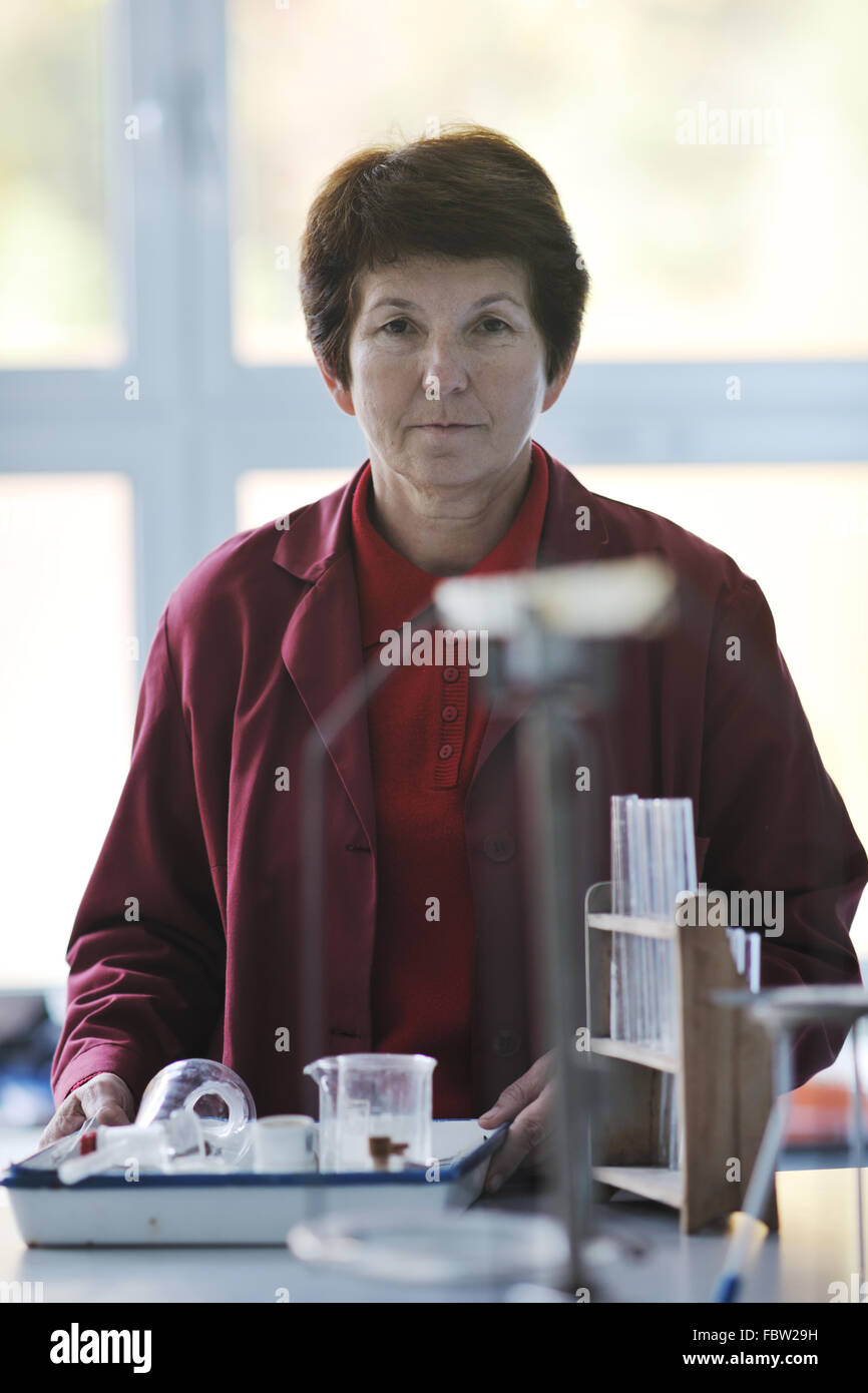 science and chemistry teacher portrait in classroom Stock Photo - Alamy