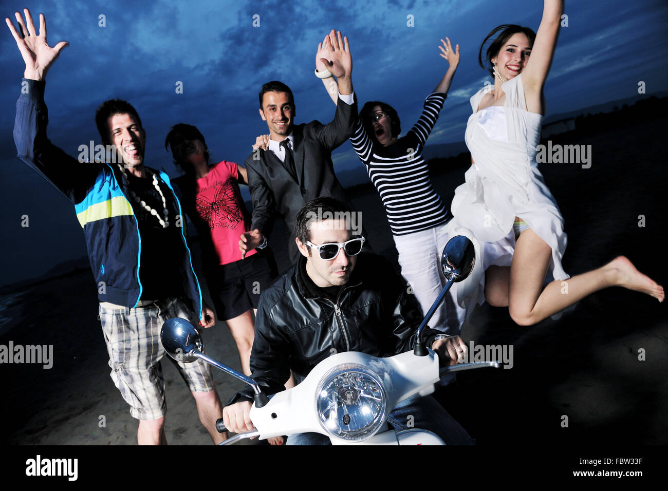 happy young people group have fun on beach Stock Photo - Alamy