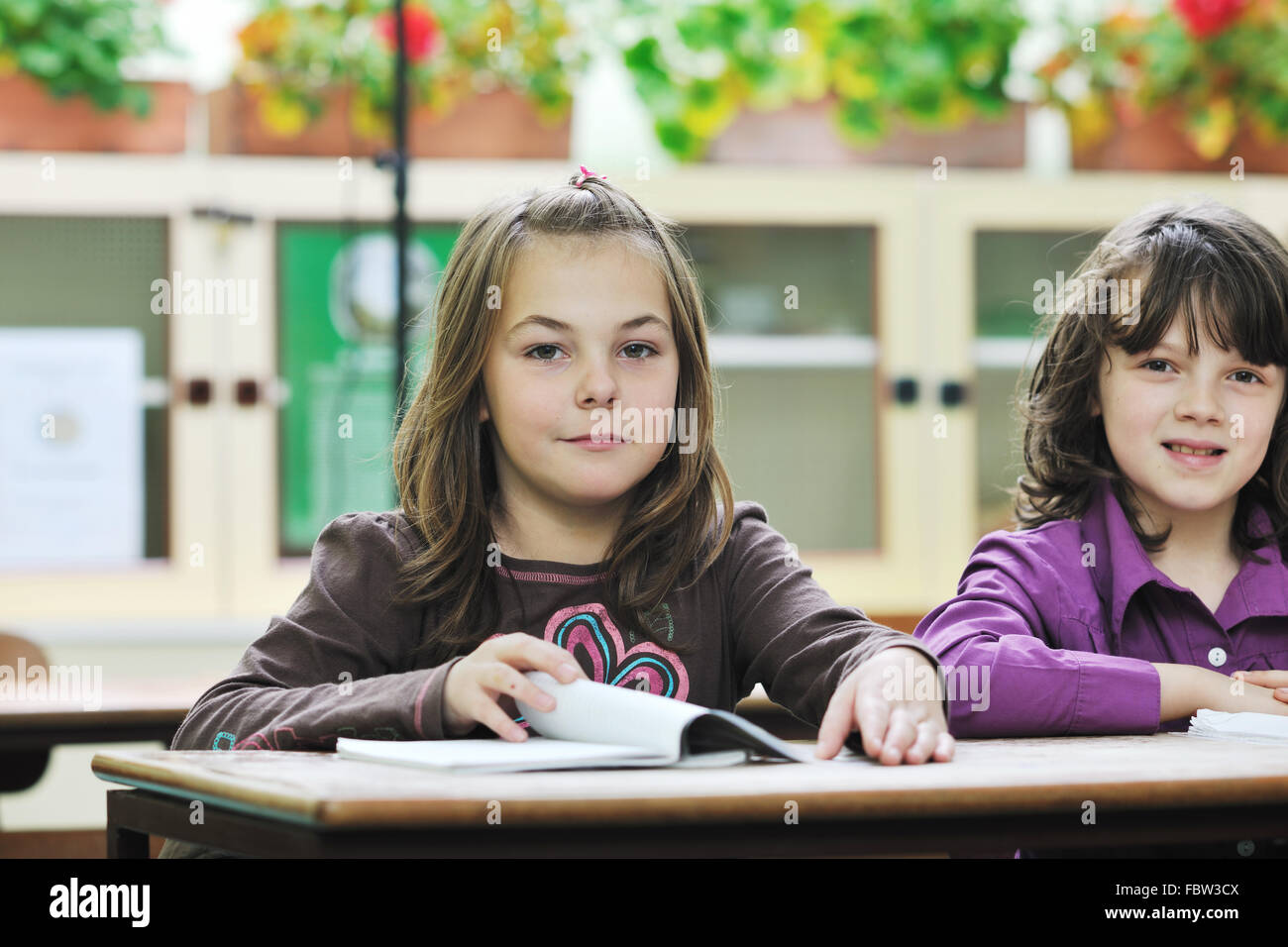 happy child in schoold have fun and learning leassos Stock Photo - Alamy