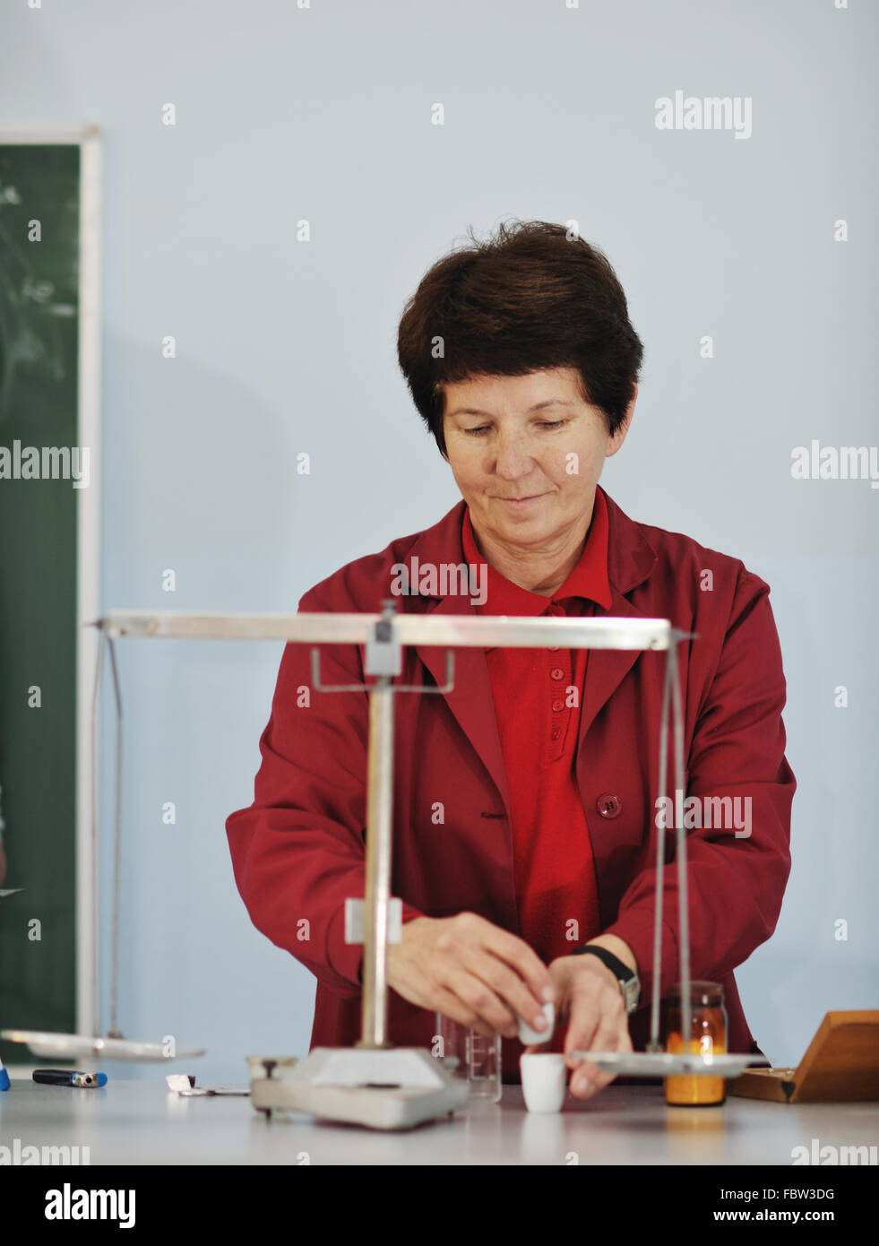 science and chemistry teacher portrait in classroom Stock Photo - Alamy