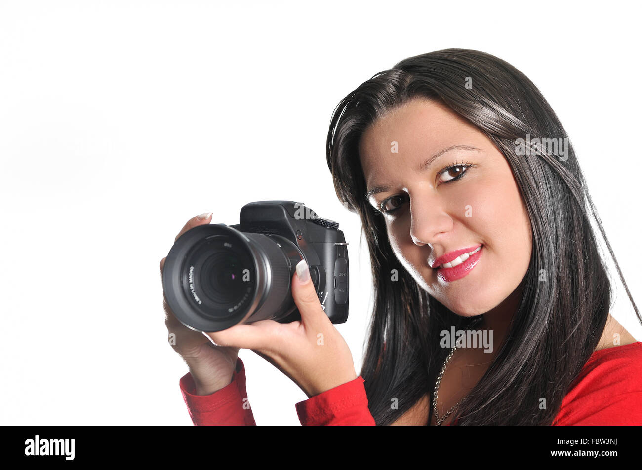 Young woman holding camera in hand taking picture isolated Stock Photo ...