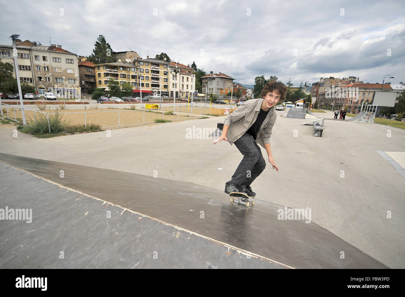 Boy practicing skate in a skate park - isolated Stock Photo - Alamy