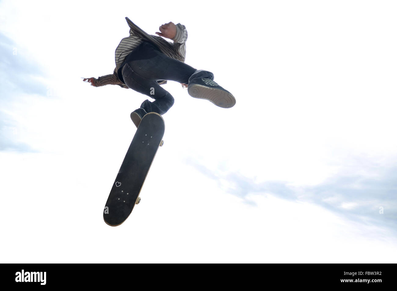Boy practicing skate in a skate park - isolated Stock Photo - Alamy