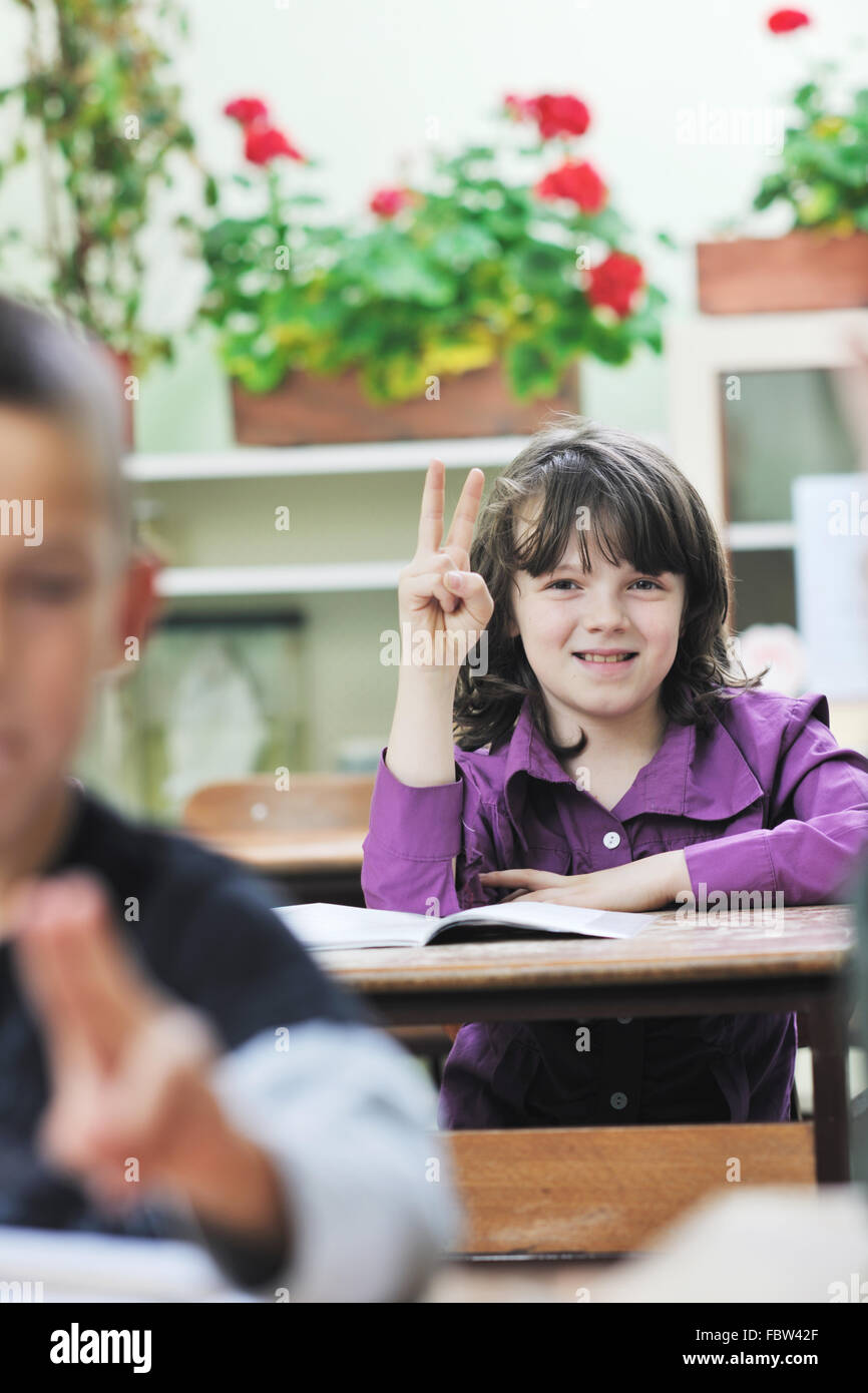 happy child in schoold have fun and learning leassos Stock Photo - Alamy